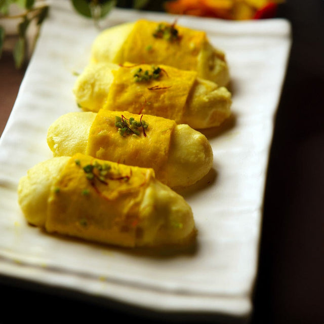 kesar malai roll – Ganguram Sweets
